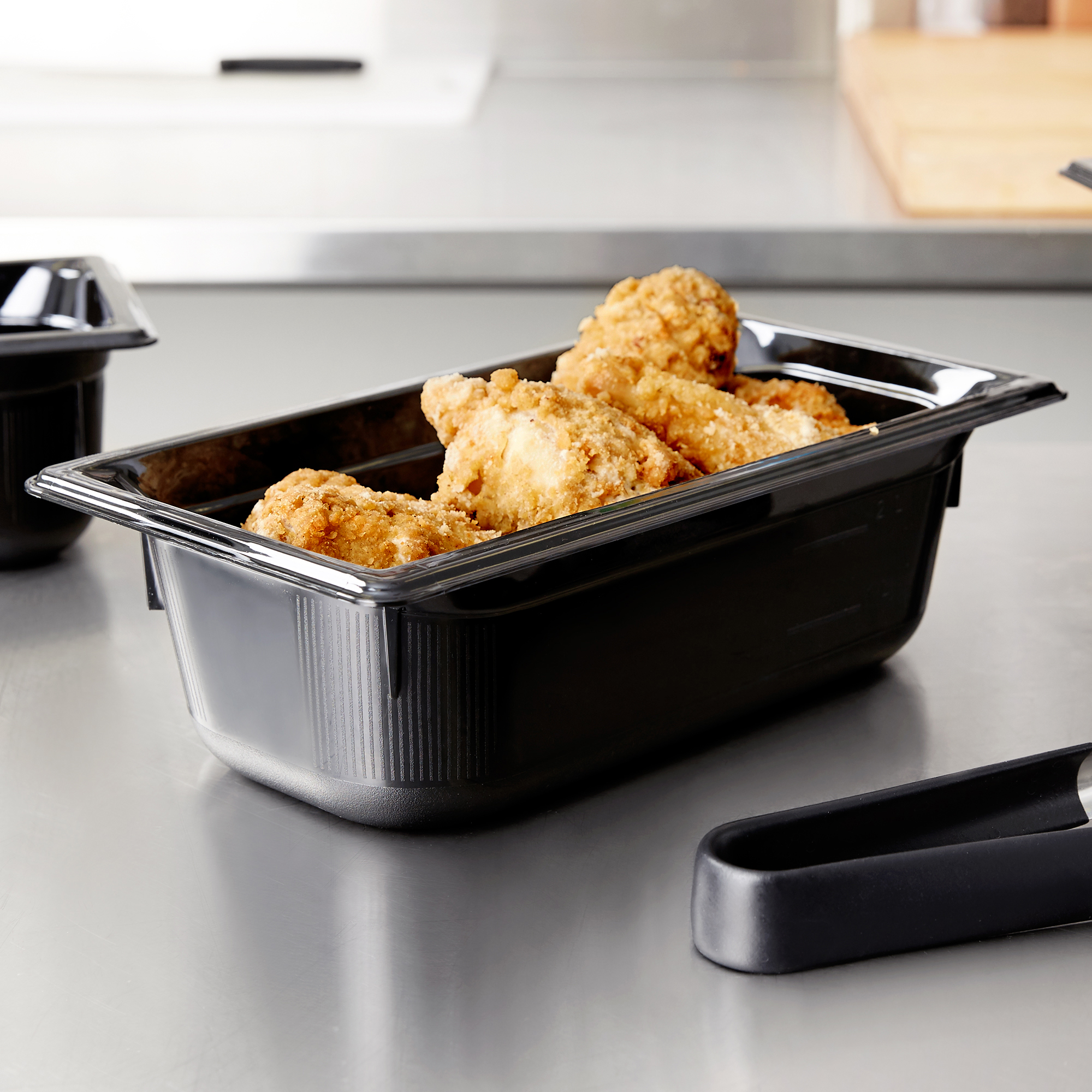 Third-size 4-inch-deep Super Pan® high-temperature plastic pan in black ...