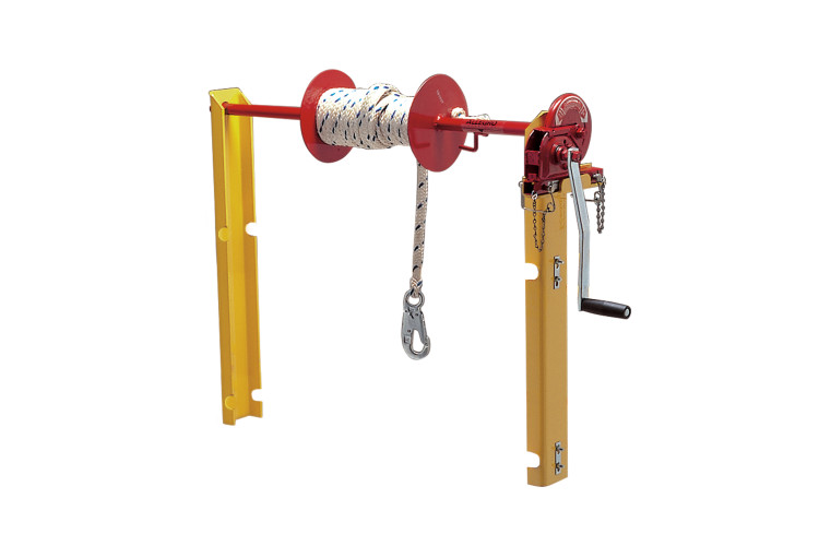 Raises and lowers equipment into confined spaces